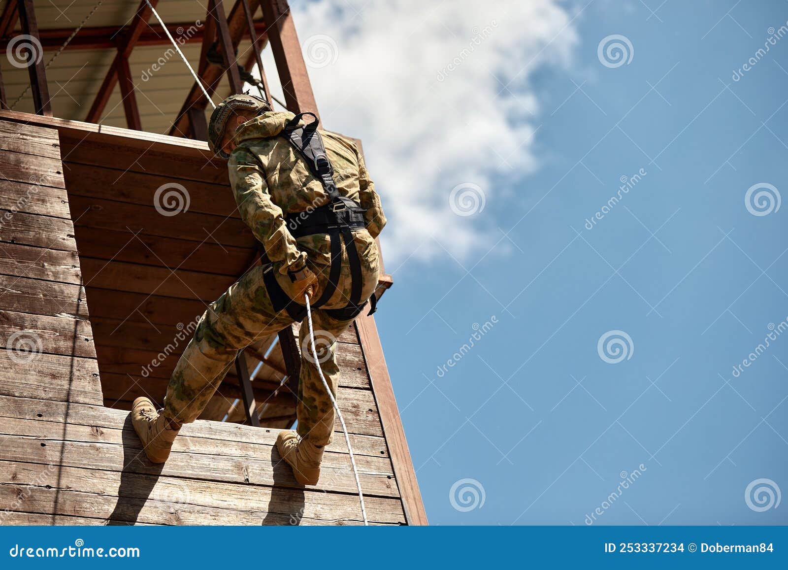 Military Soldier Climbing Net during Obstacle Course in Boot Camp Stock ...