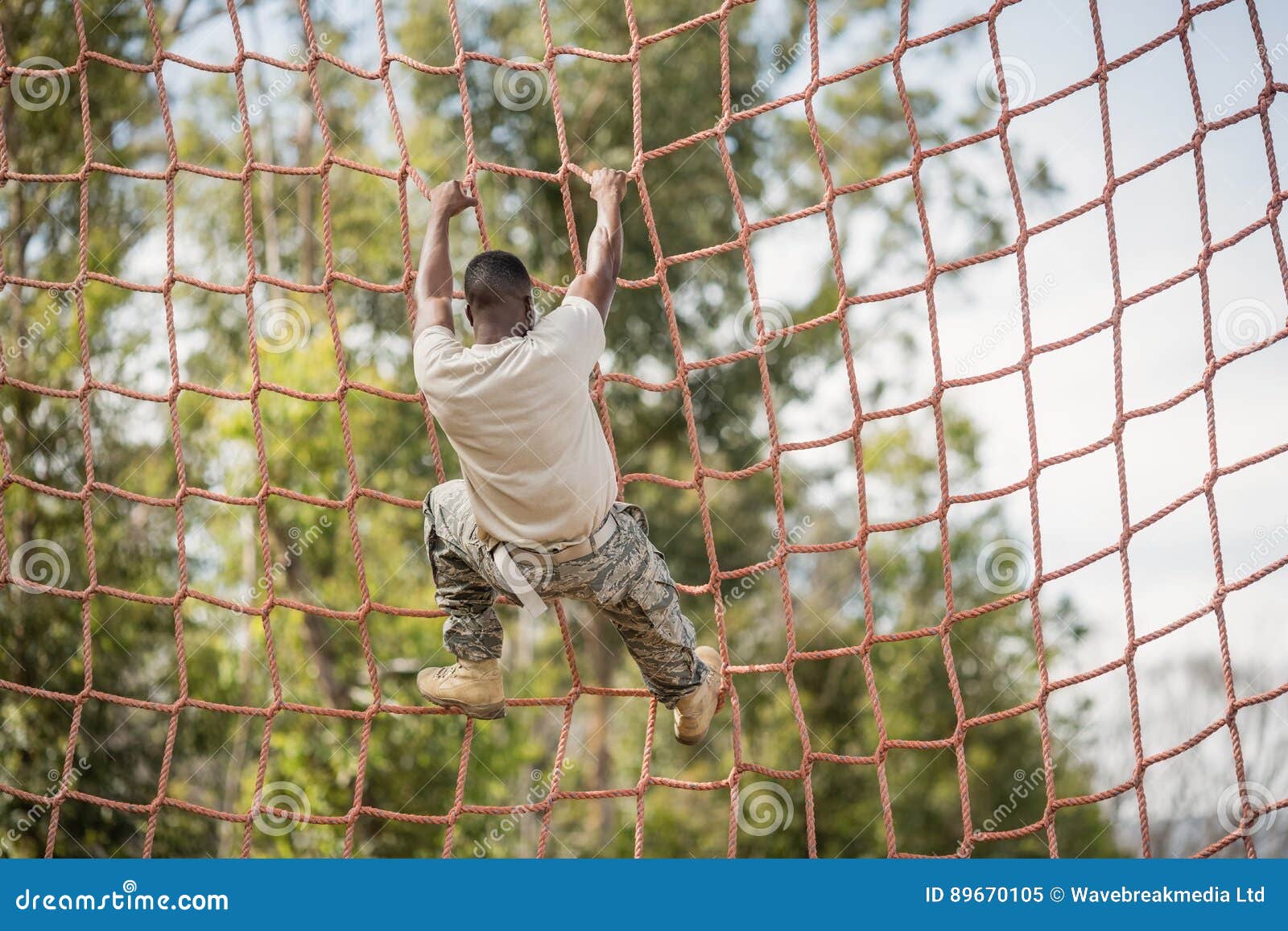 Military Soldier Climbing Net during Obstacle Course Stock Image ...
