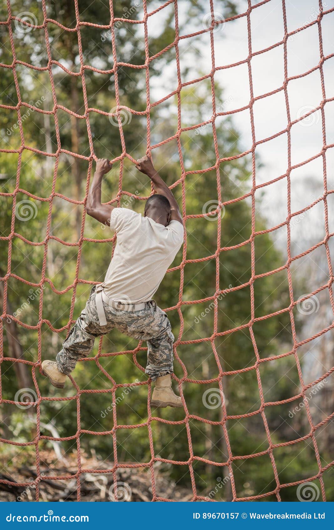 Military Soldier Climbing Net during Obstacle Course Stock Image ...