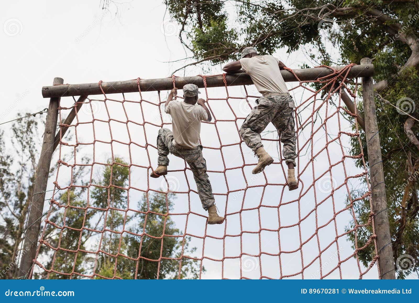 Military Soldier Climbing a Net during Obstacle Course Stock Image ...
