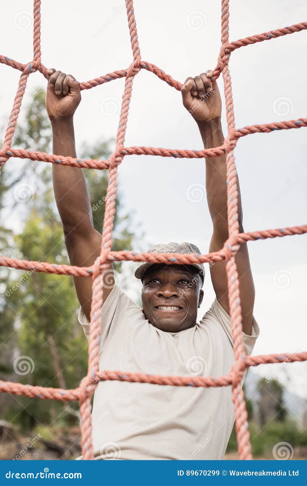 Military Soldier Climbing a Net during Obstacle Course Stock Image ...