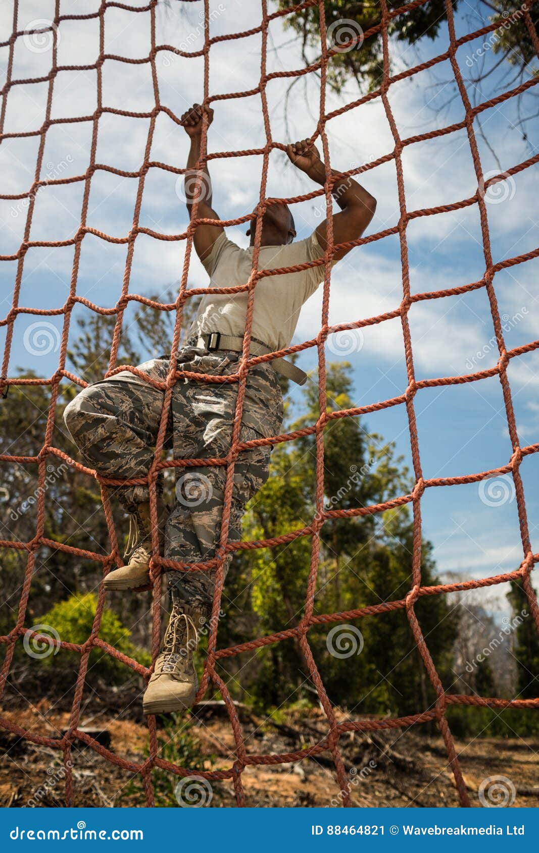 Military Soldier Climbing Rope during Obstacle Course Stock Image ...