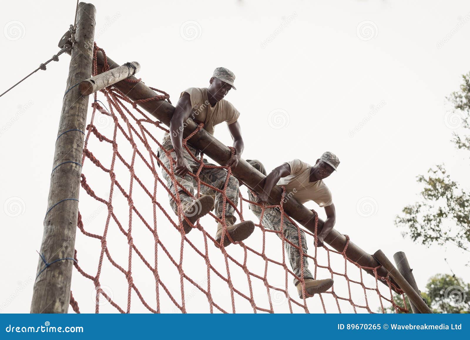 Military Soldiers Climbing a Net during Obstacle Course Stock Image ...