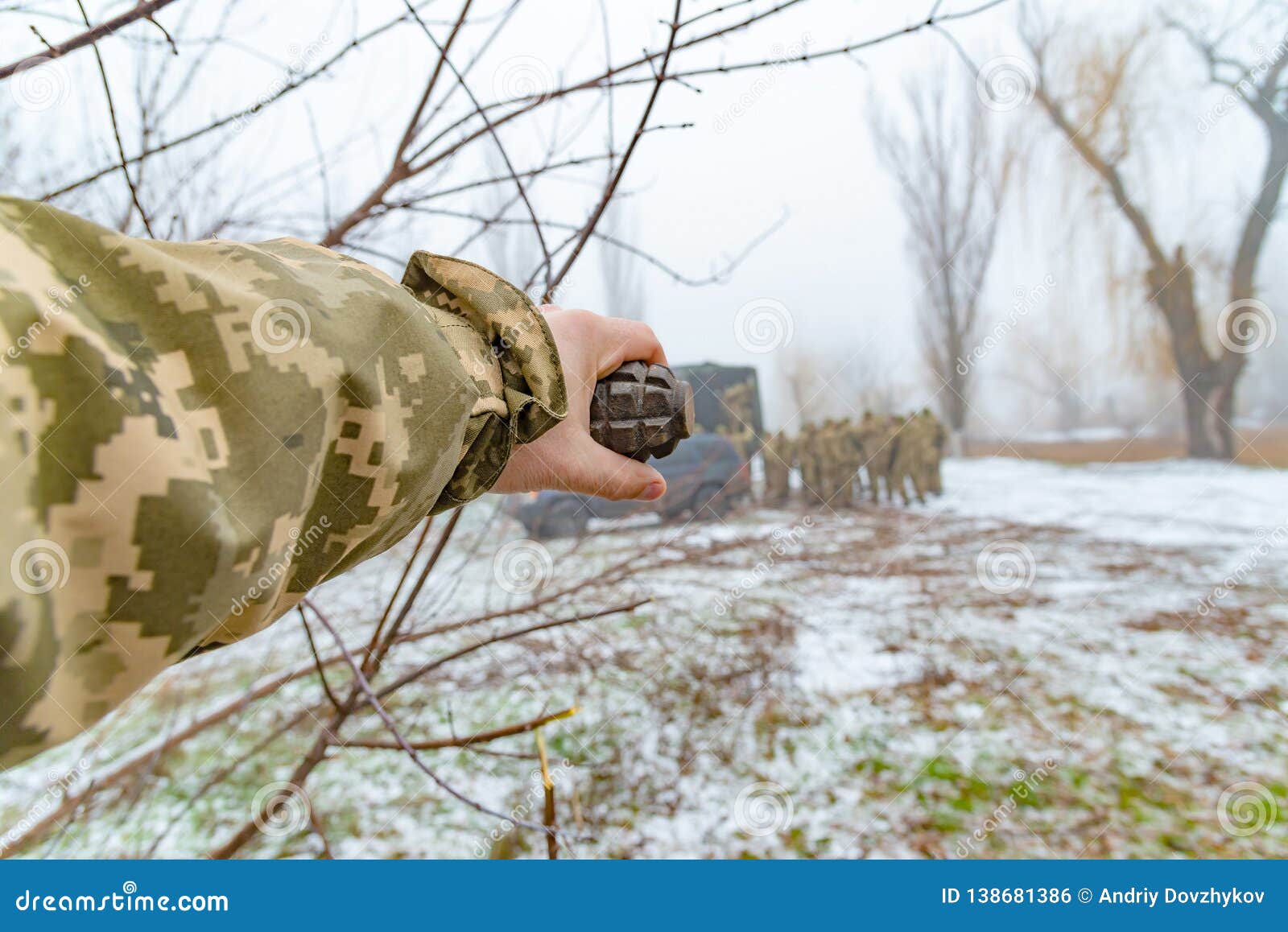 The Military Throws a Fragmentation Grenade with His Hand Stock Photo ...