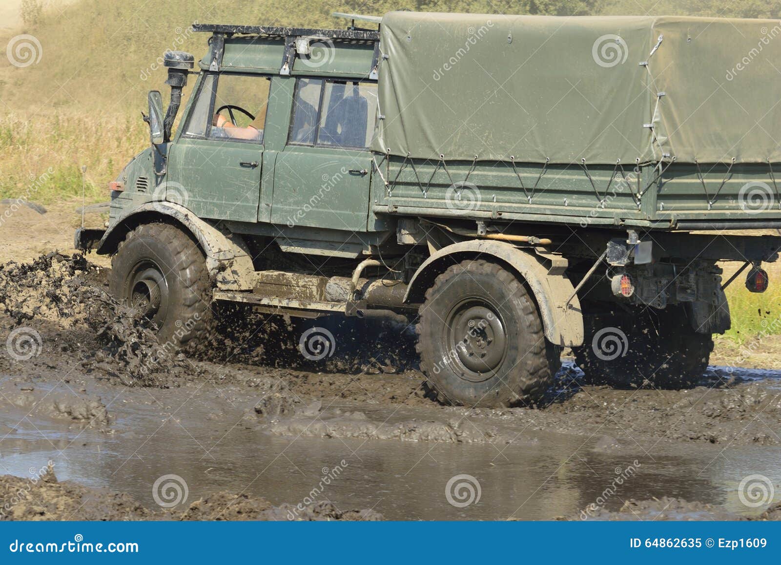 Military unimog stock image. Image of vehicles, reconstruction - 64862635