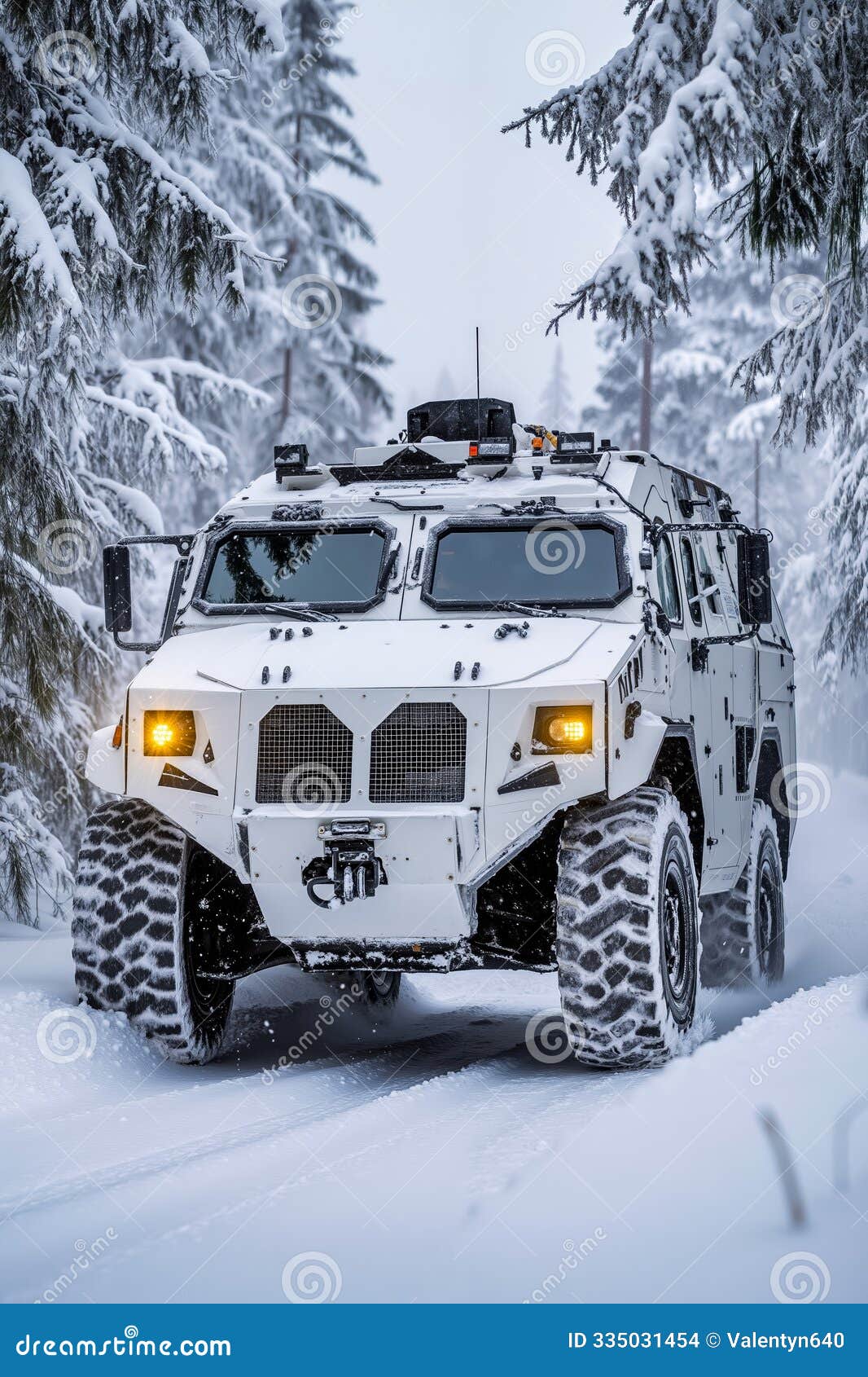 A Military Vehicle Driving through a Snowy Forest Stock Photo - Image ...