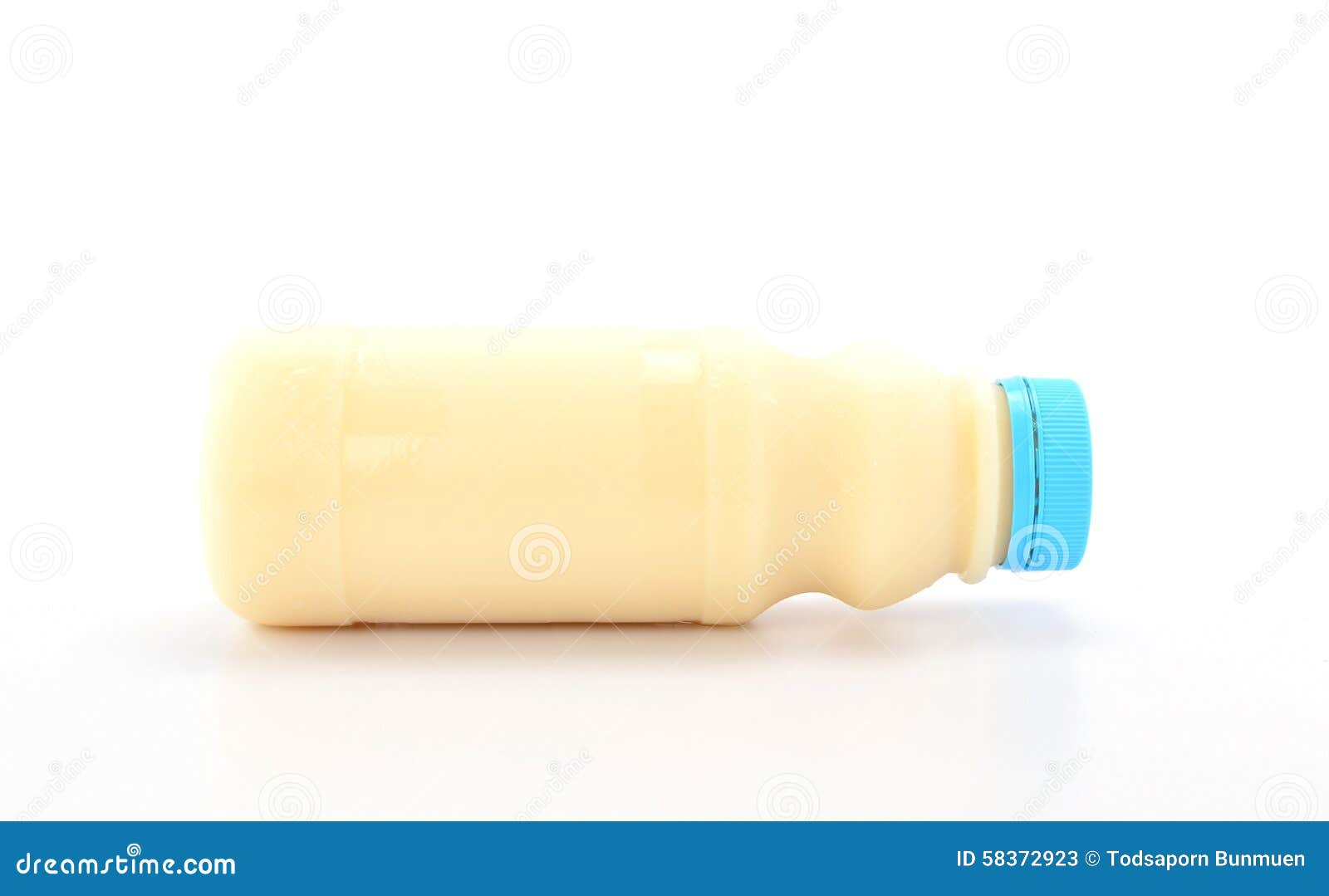 Milk Bottle with Blue Cap on White Background Stock Image - Image of ...