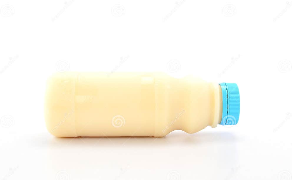 Milk Bottle with Blue Cap on White Background Stock Image - Image of ...