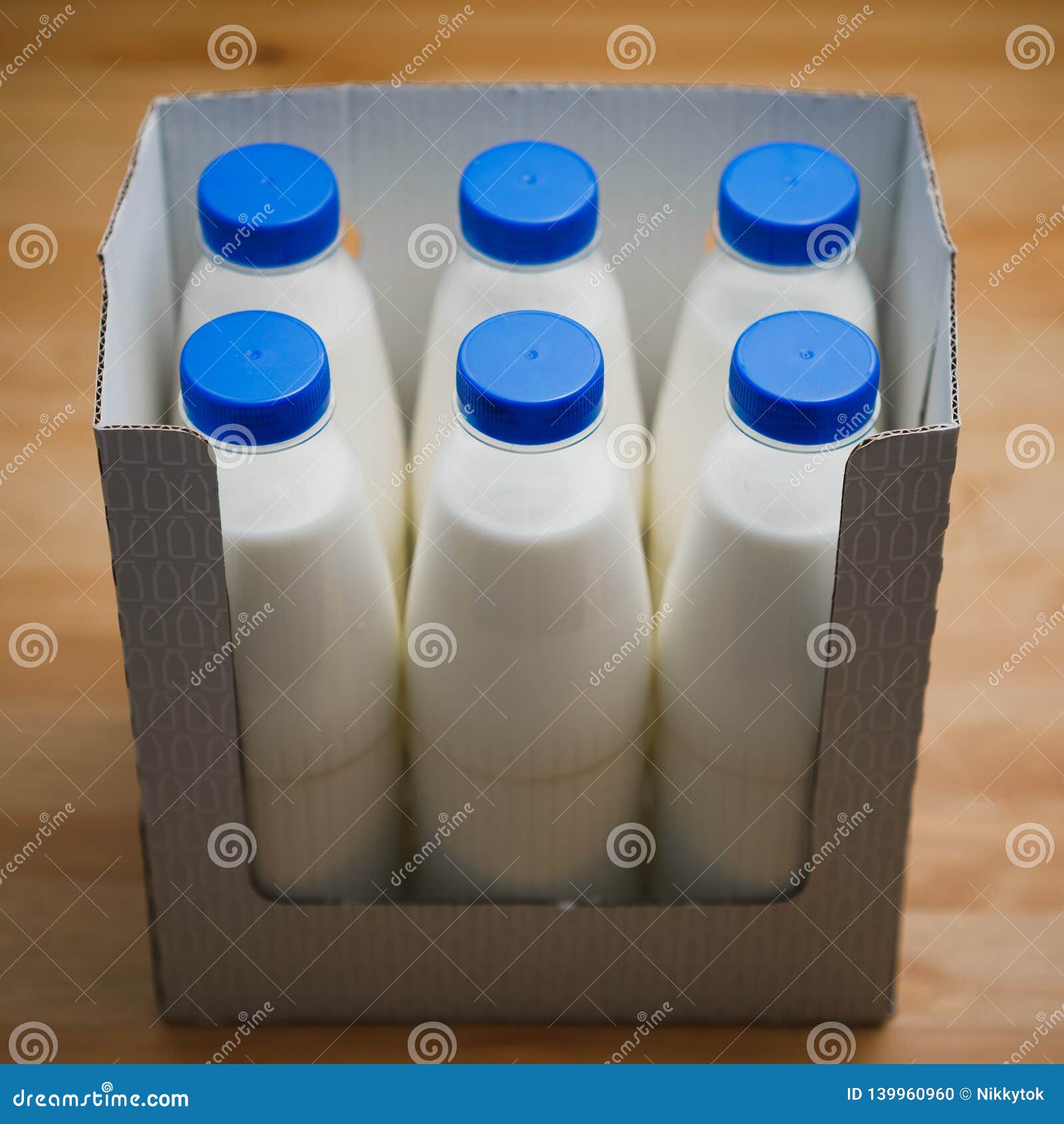 Milk Bottles in Cardboard Box Stock Photo - Image of cardboard, group ...