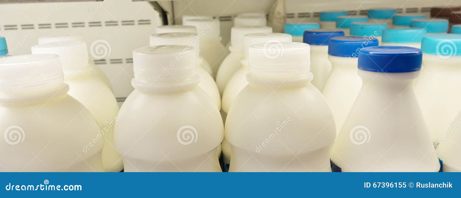 Milk bottles on shelf stock image. Image of shop, calcium - 67396155
