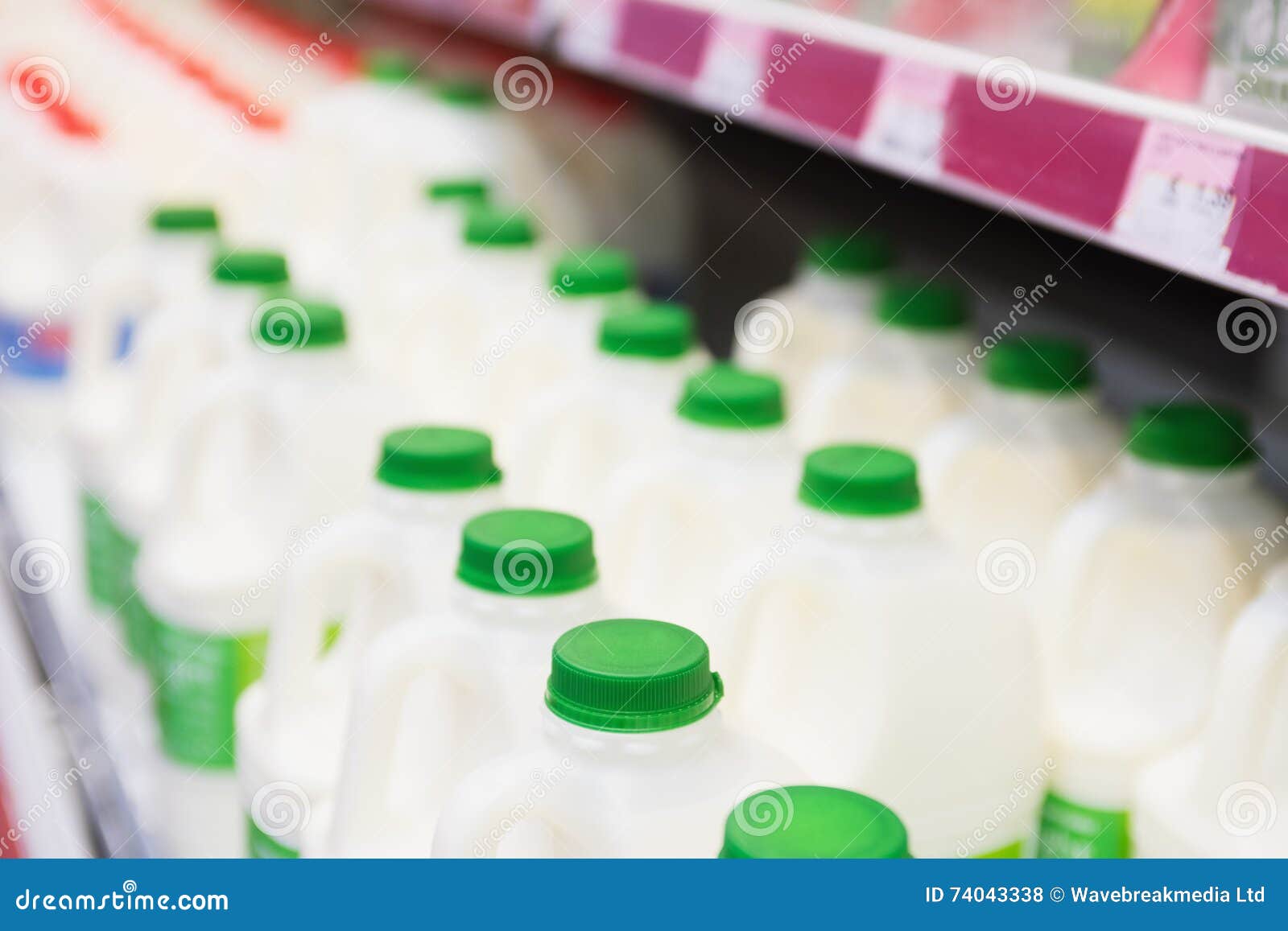Milk Bottles Tidied in Shelf Stock Photo - Image of retail, consumerism ...