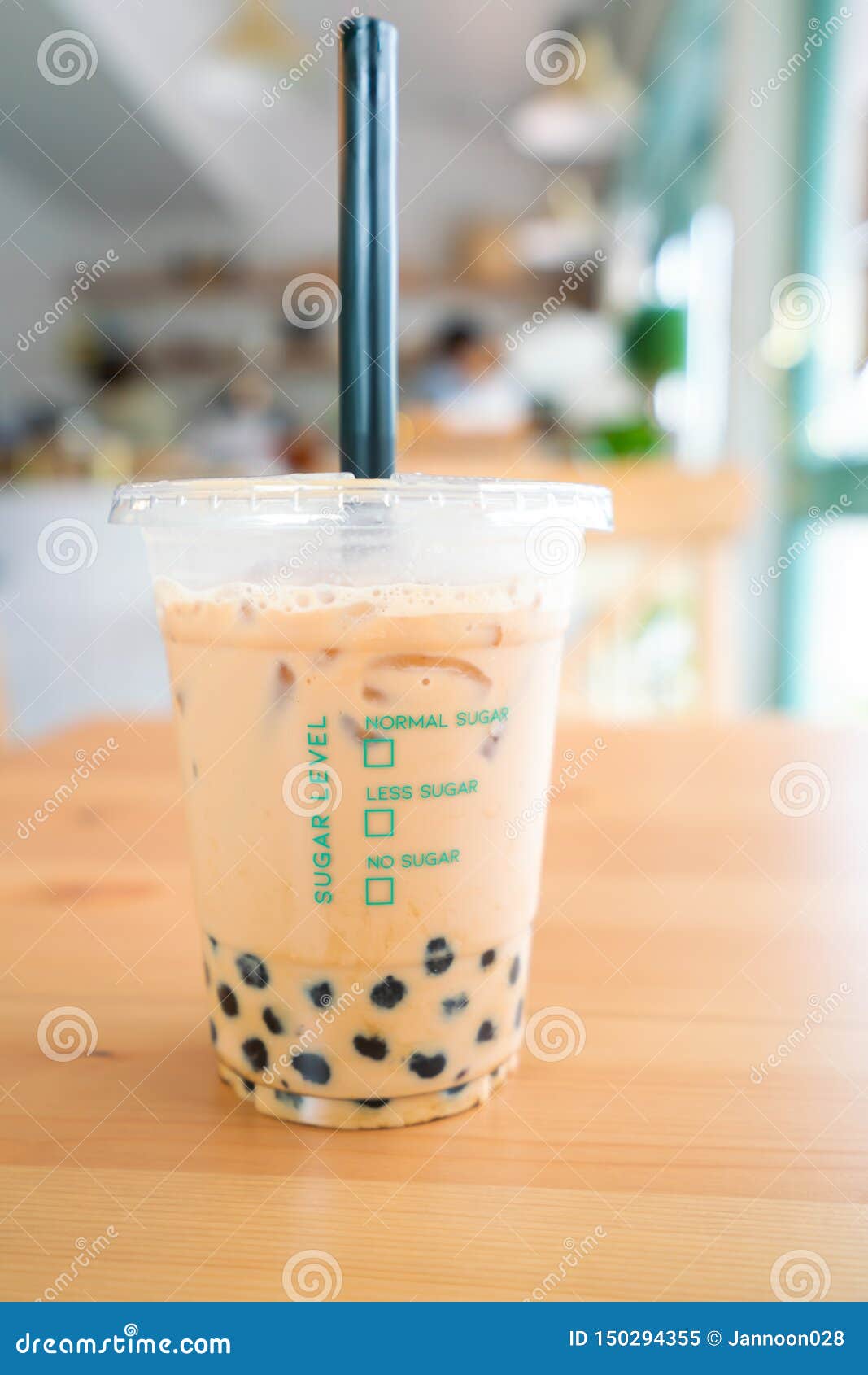 Milk Bubble Tea with Tapioca Pearls on Wooden Table Stock Image - Image ...