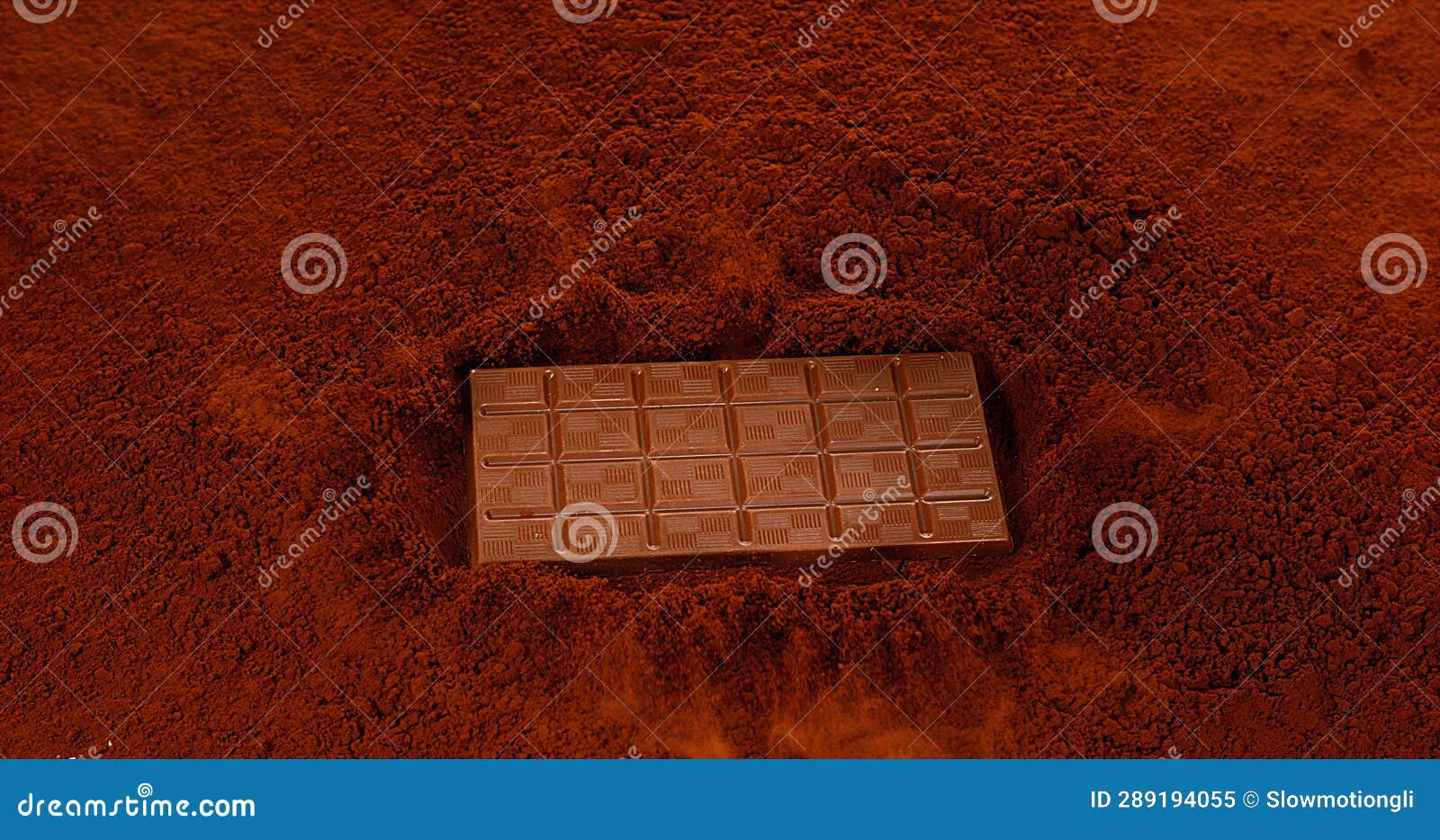 Milk Chocolate Tablet Falling on Black Chocolate Powder Stock Image ...