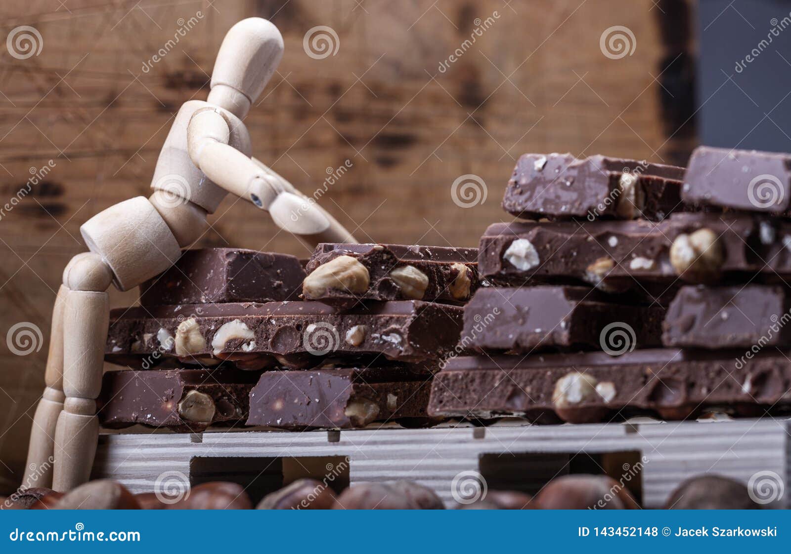 Milk Chocolate with Whole Hazelnuts Placed on a Pallet Stock Photo ...