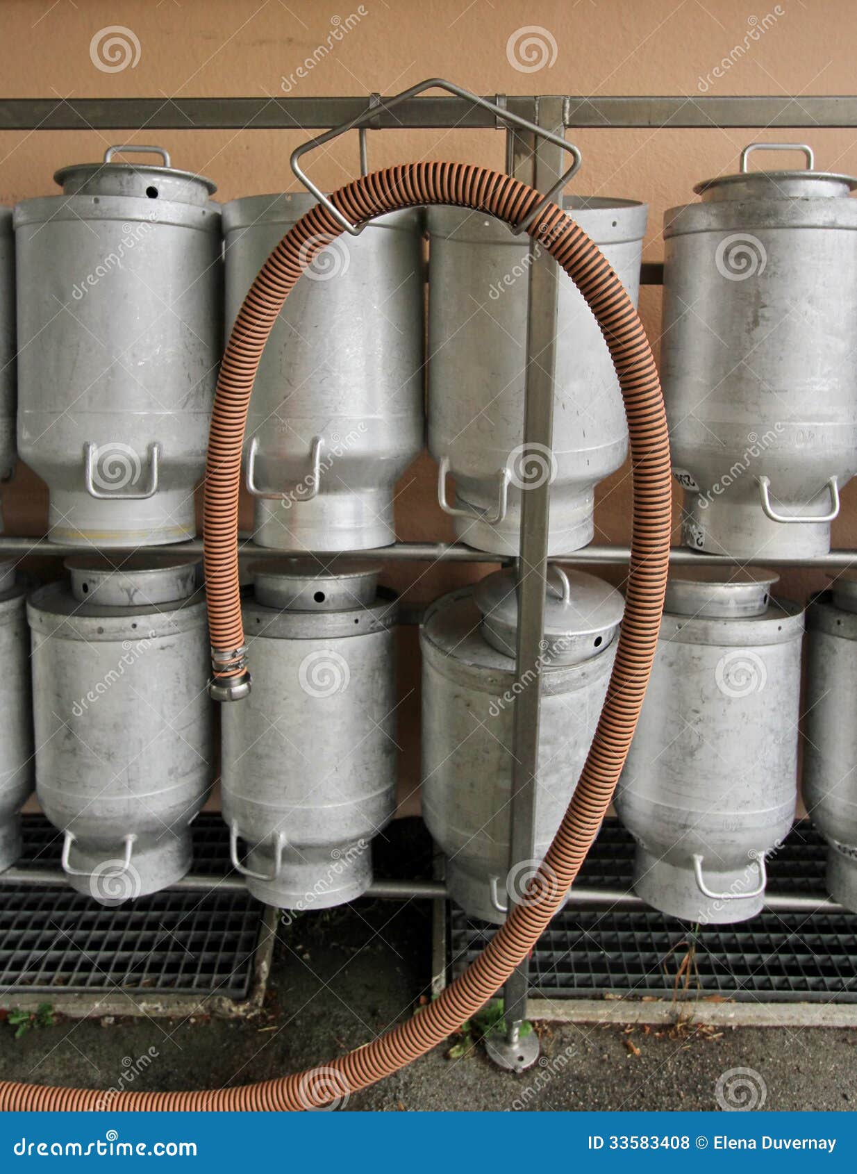 Milk churns at the dairy stock photo. Image of historical - 33583408
