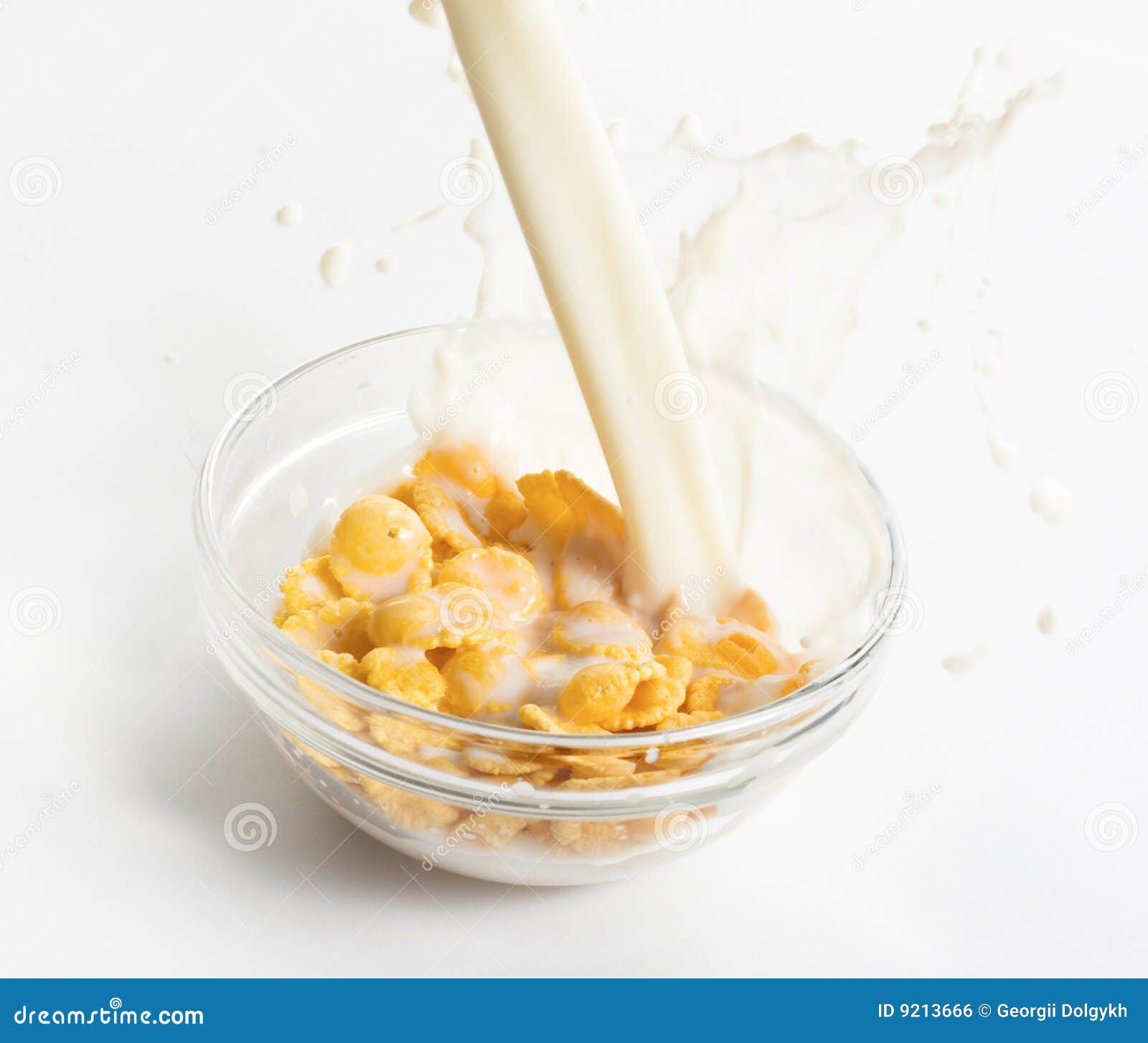 Milk Flowing on a Bowl of Cornflakes Stock Photo - Image of flake ...