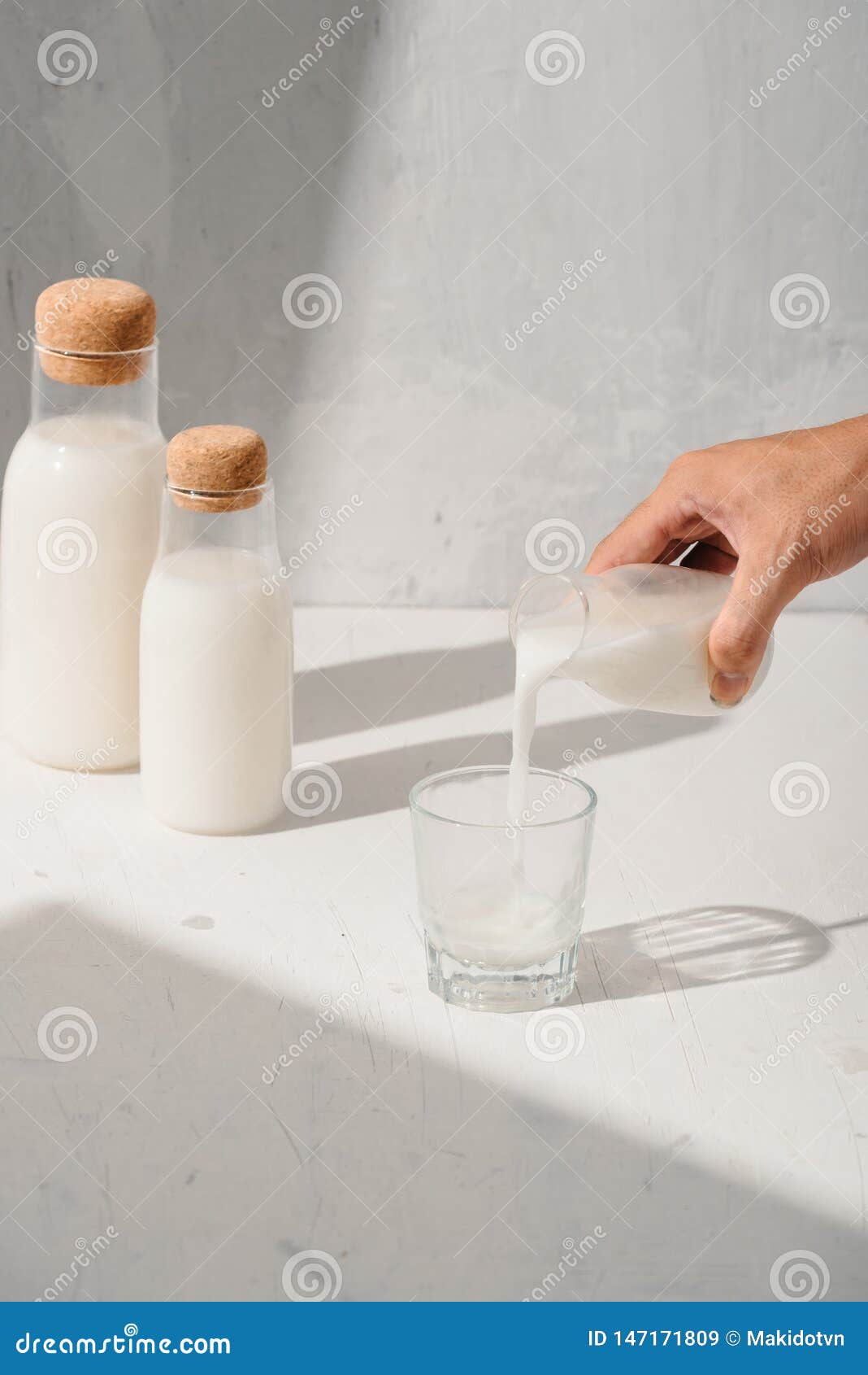 Milk from a Jug Pouring into Glass Stock Image - Image of fresh ...