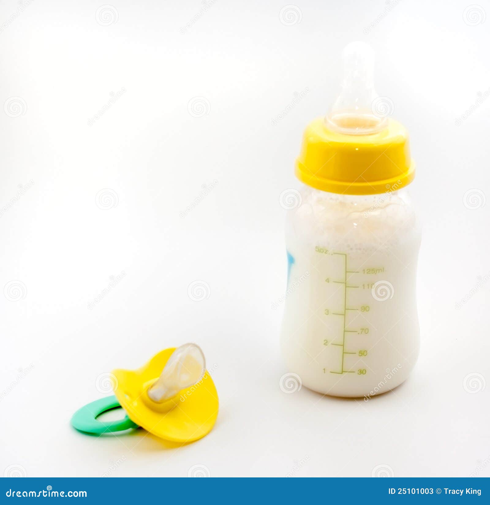 Milk and the pacifier stock image. Image of isolated - 25101003