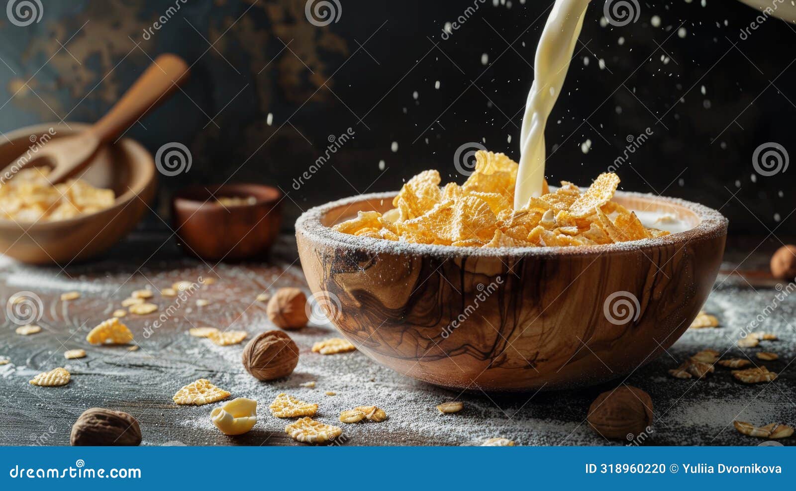 Milk Is Poured In Cornflakes In Wooden Bowl. Exploding Of Cornflakes ...