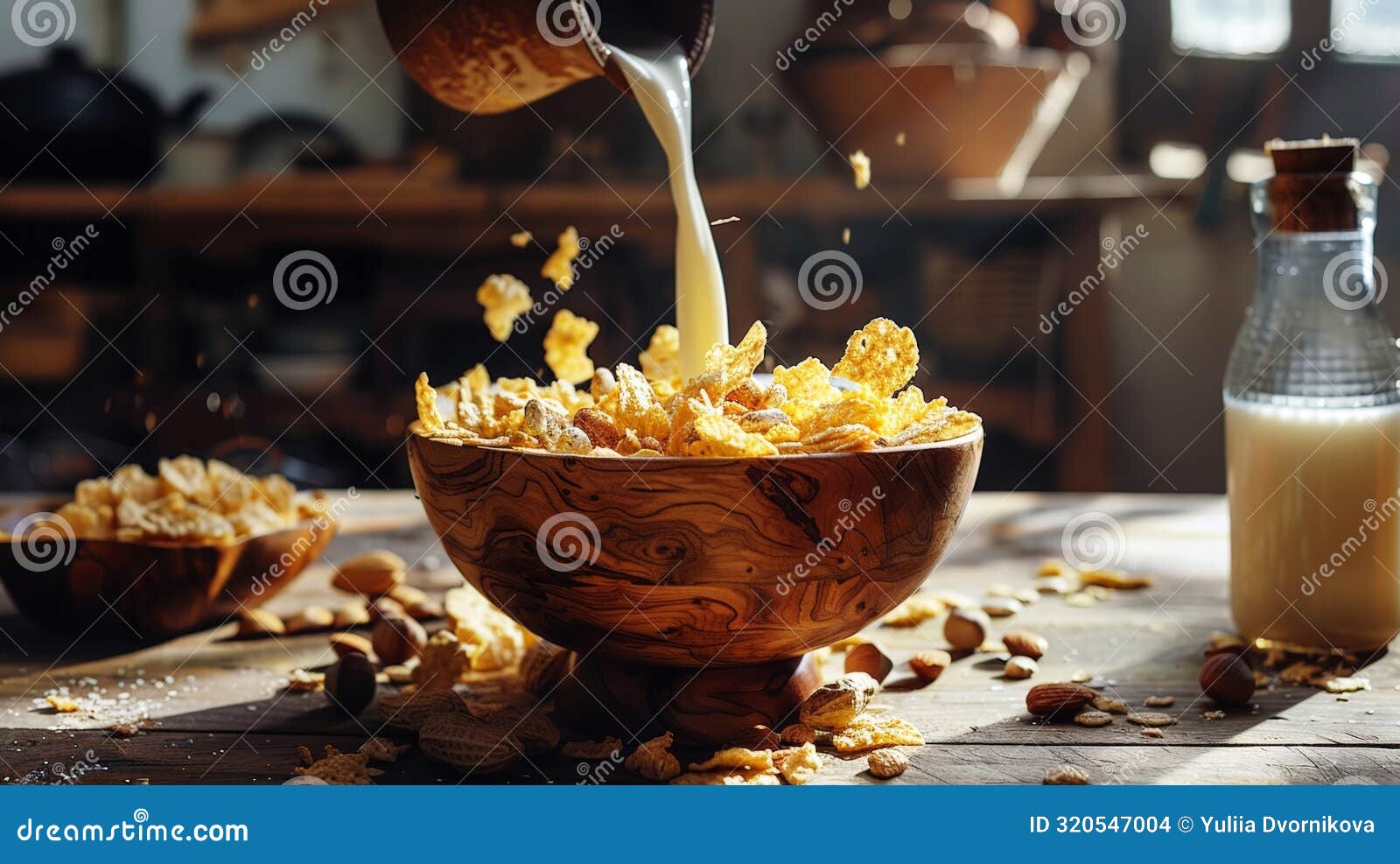 Milk is Poured in Cornflakes in Wooden Bowl. Exploding of Cornflakes ...