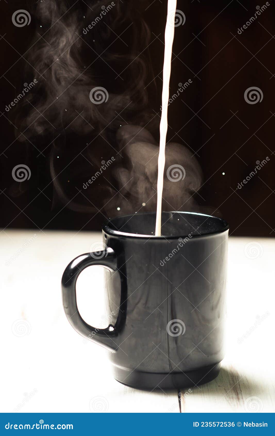 Milk is Poured into a Cup of Hot Coffee Stock Photo - Image of liquid ...