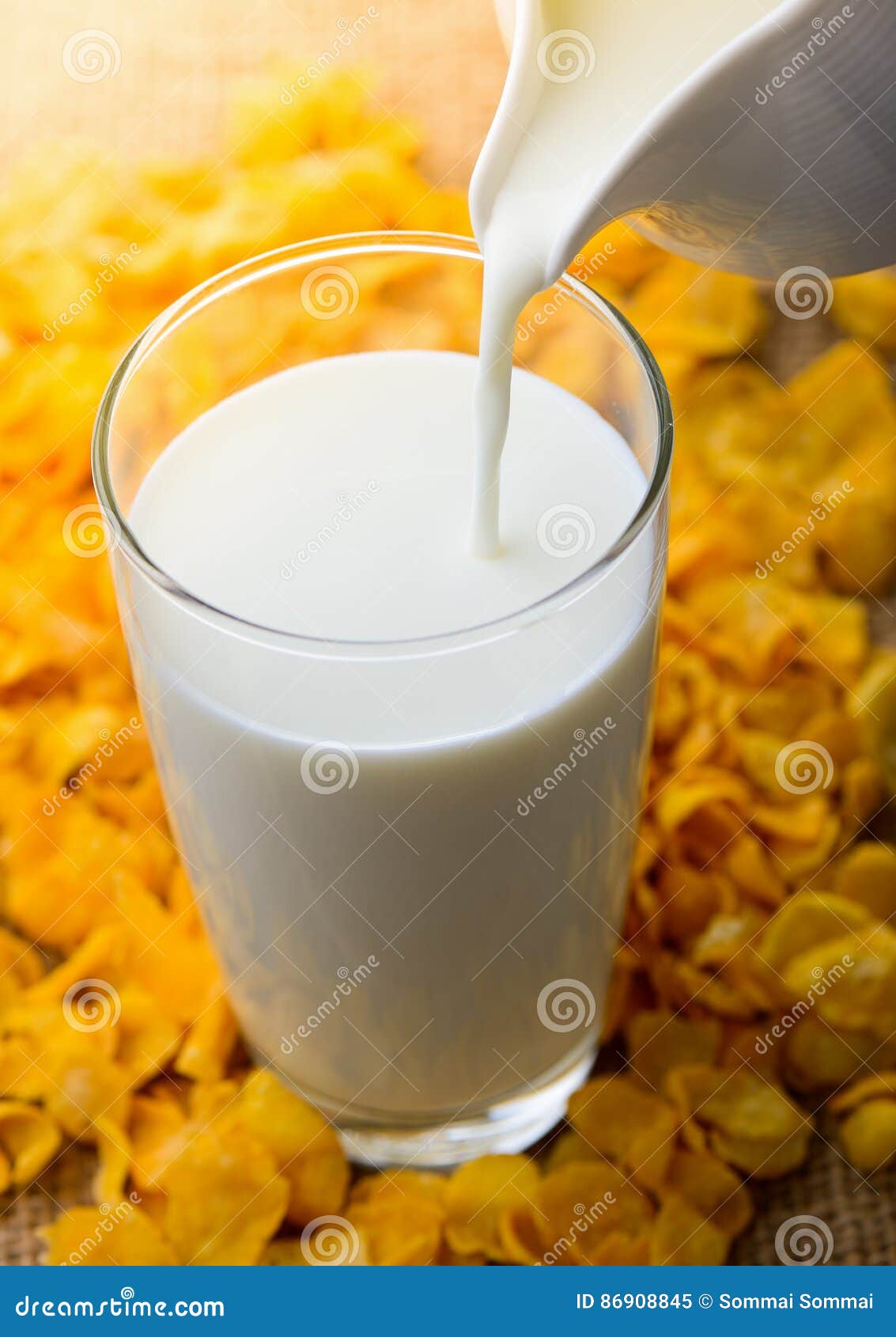 Milk pouring from a jug stock image. Image of nutrition - 86908845