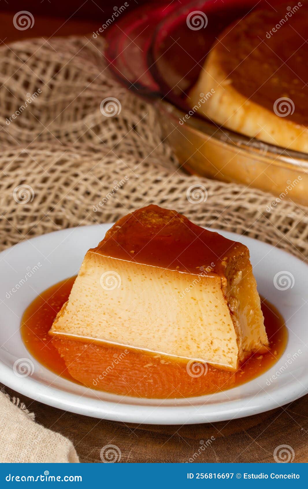 Milk Pudding on White Plate in Rustic Setting Stock Image - Image of ...