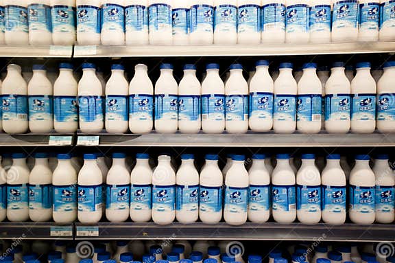 Milk shelf at Walmart editorial photography. Image of walmart - 17901572