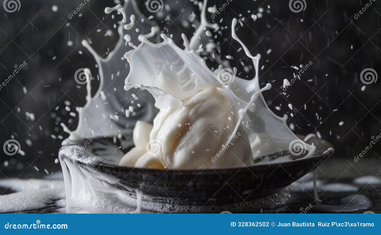 Milk splash with dumpling stock photo. Image of striking - 328362502