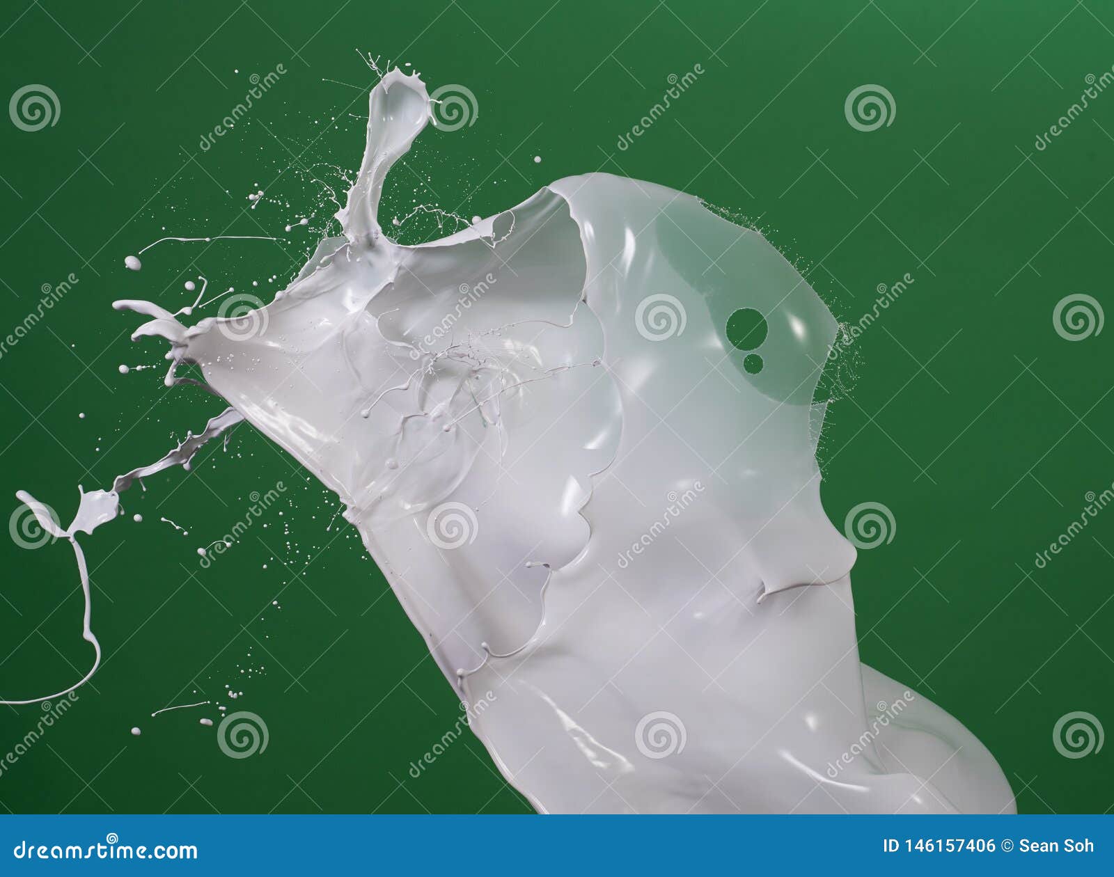 Milk Splash in Green Matt Background Stock Photo - Image of milk ...