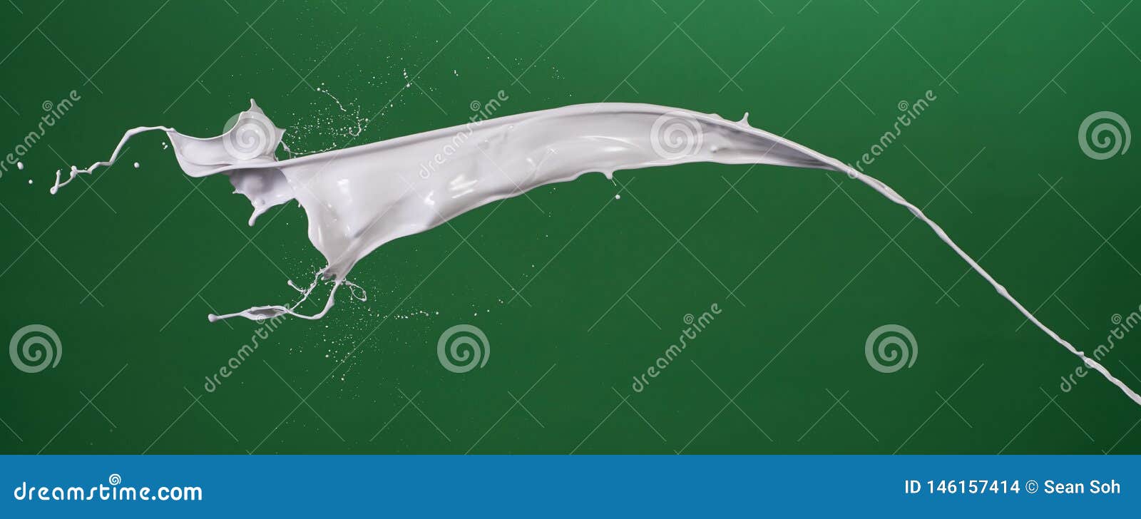 Milk Splash in Green Matt Background Stock Photo - Image of balloon ...