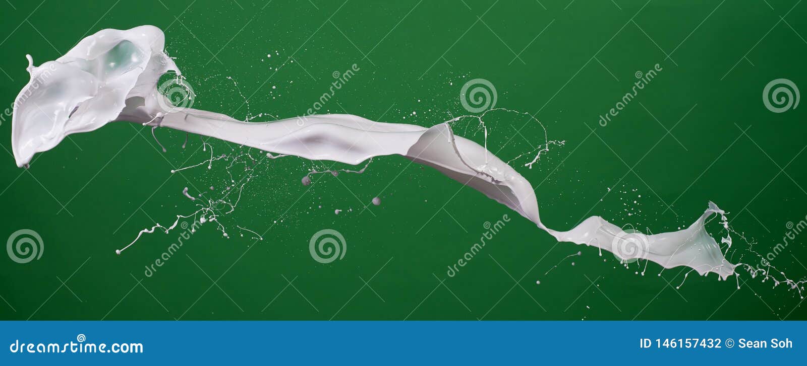 Milk Splash in Green Matt Background Stock Photo - Image of water ...