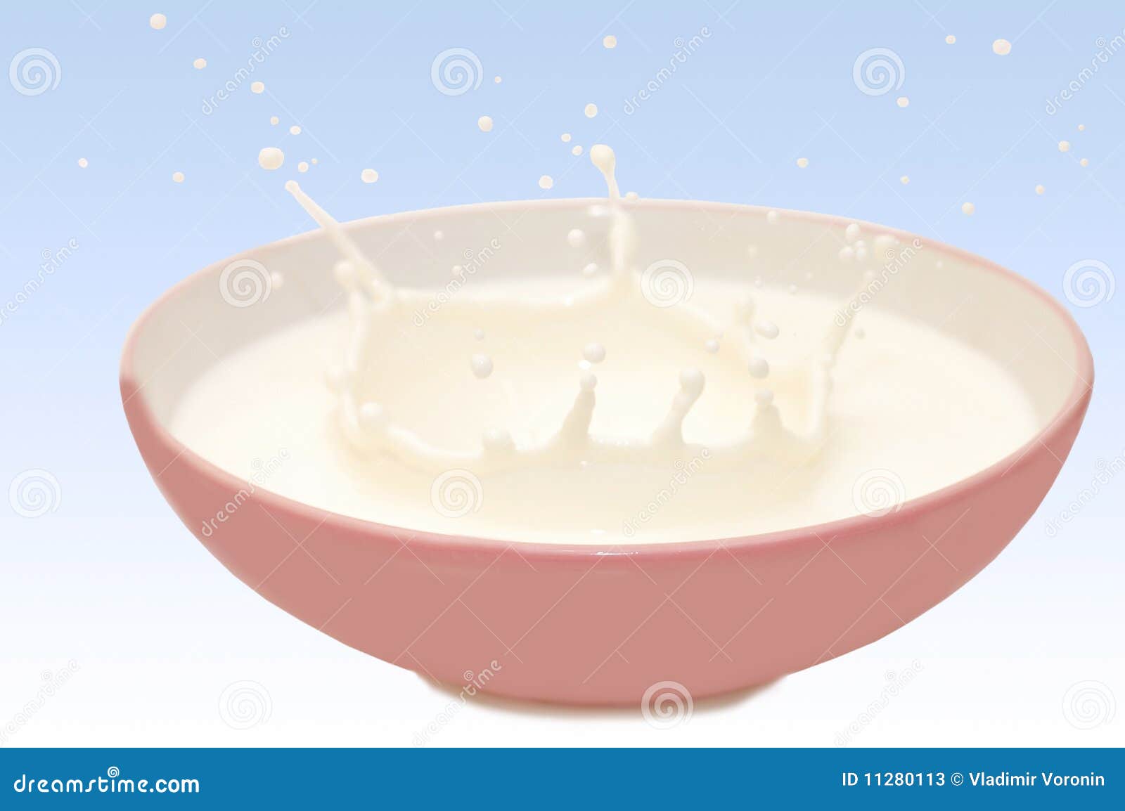 Milk splash in a plate stock image. Image of healthy - 11280113