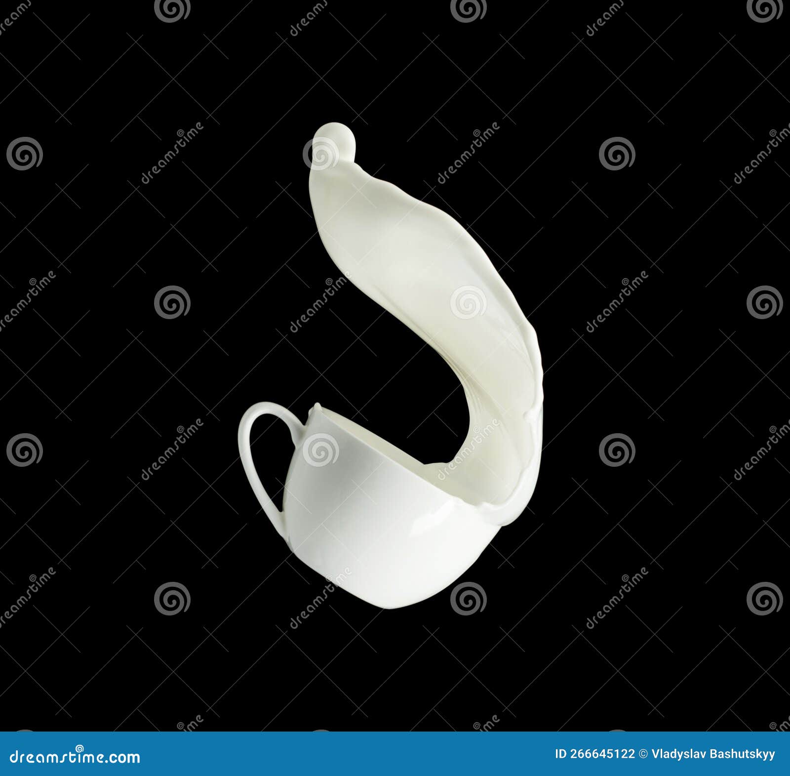 Milk Splashing Out of Cup Isolated on Black Background Stock Photo ...