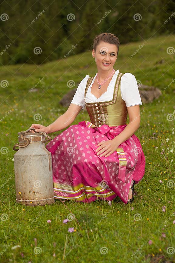 Milkmaid from the Alps stock image. Image of ecotourism - 26422809