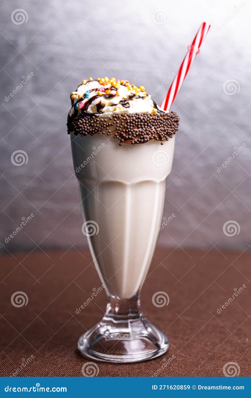 Milkshake with Multicolored Sprinkles and a Straw Stock Image - Image ...