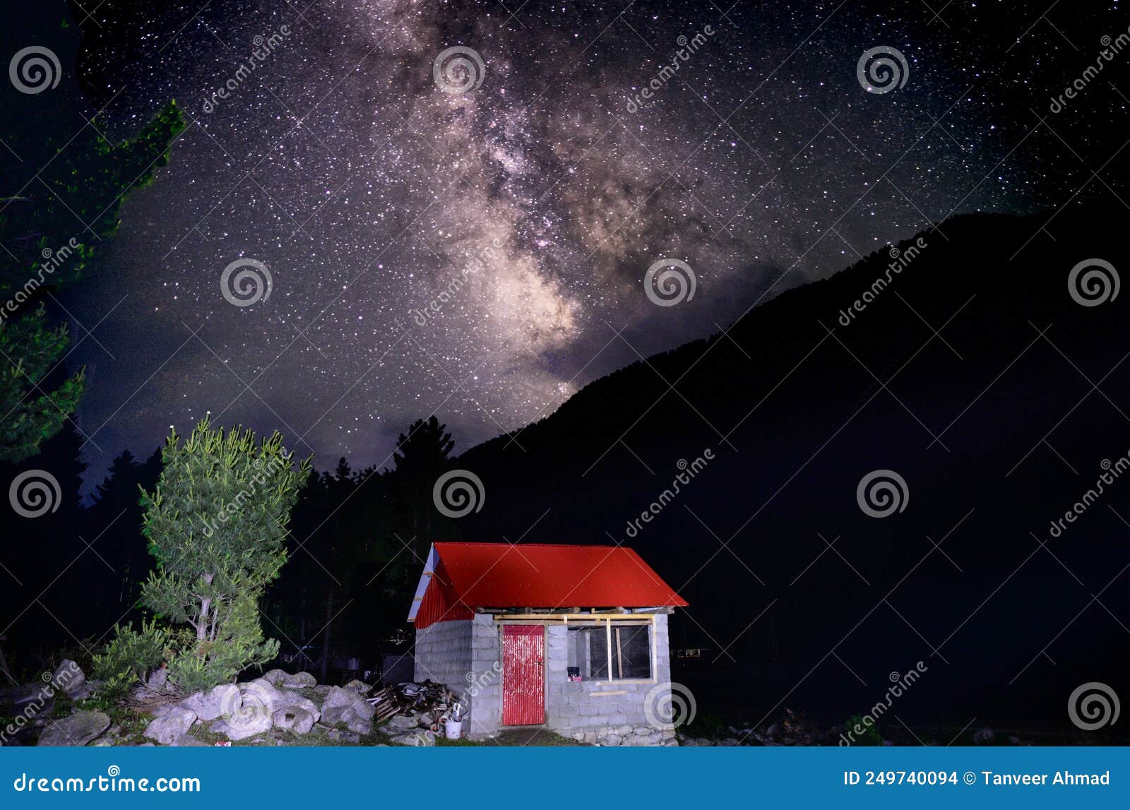 Milky Way Constellation of Stars with House and Mountains Stock Photo ...