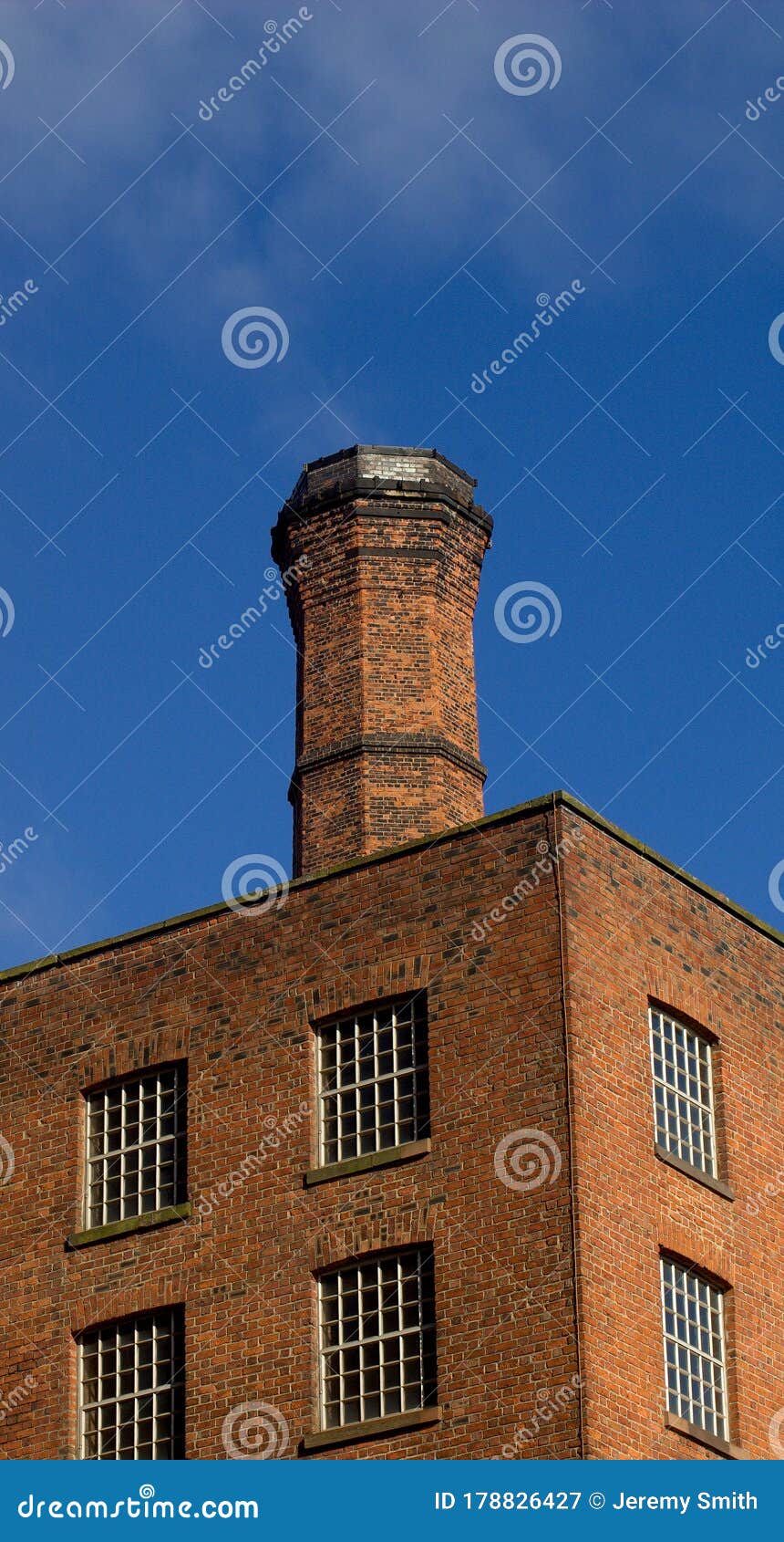 Mill chimney in Manchester stock image. Image of revolution - 178826427