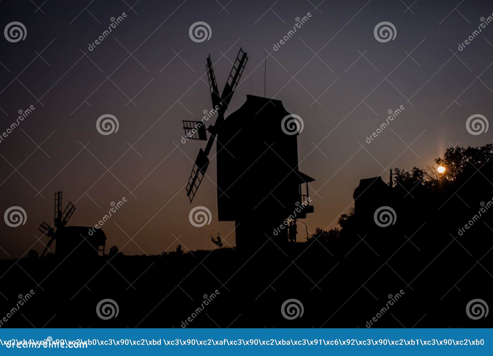 A Mill for Grain at Sunset. in Backlight Stock Photo - Image of ...
