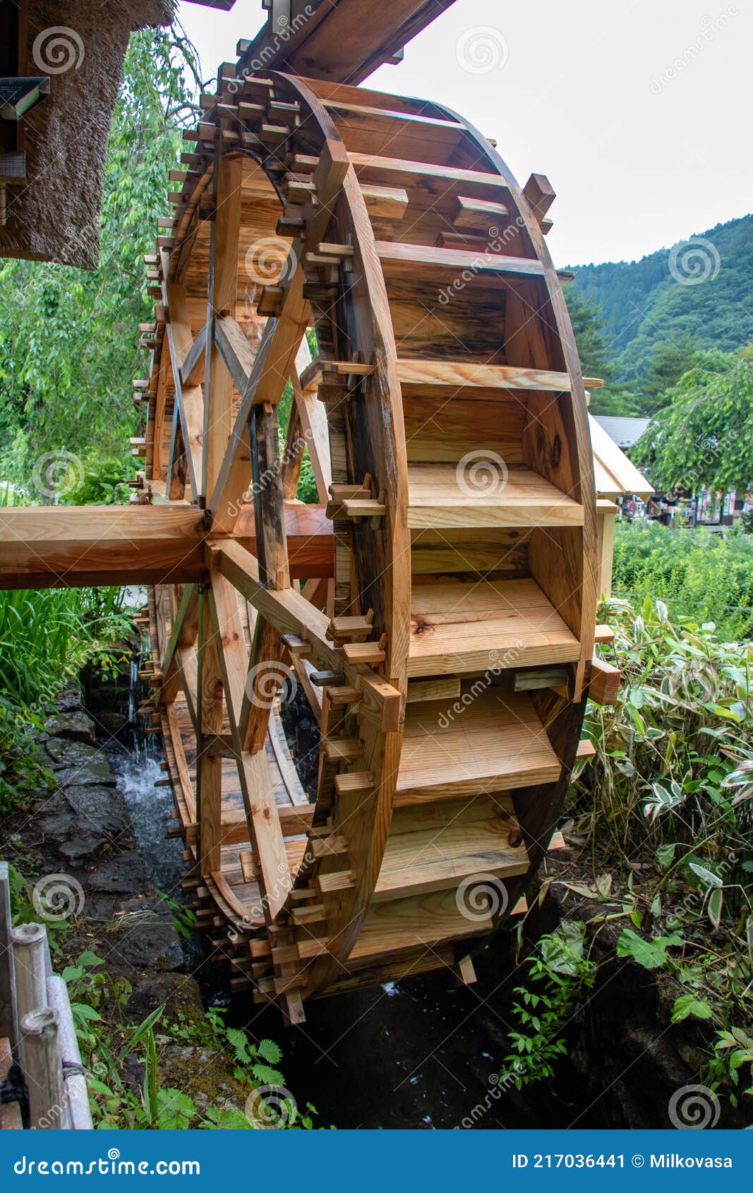 The Mill Wheel Rotates Under a Stream of Water Stock Image - Image of ...