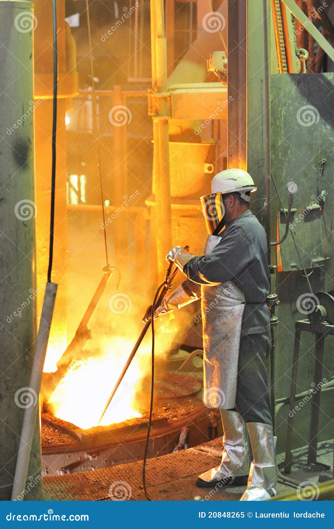 Mill worker with hot steel stock image. Image of clamp - 20848265