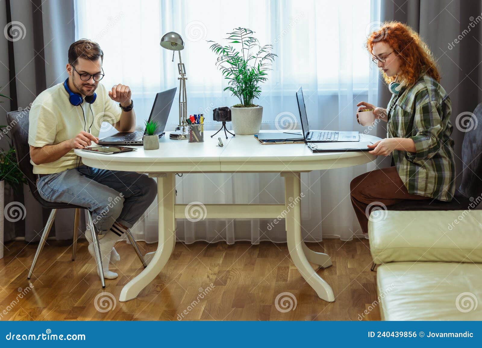 Millennial Couple Working at Home. Concept of Freelance and Remote Work ...