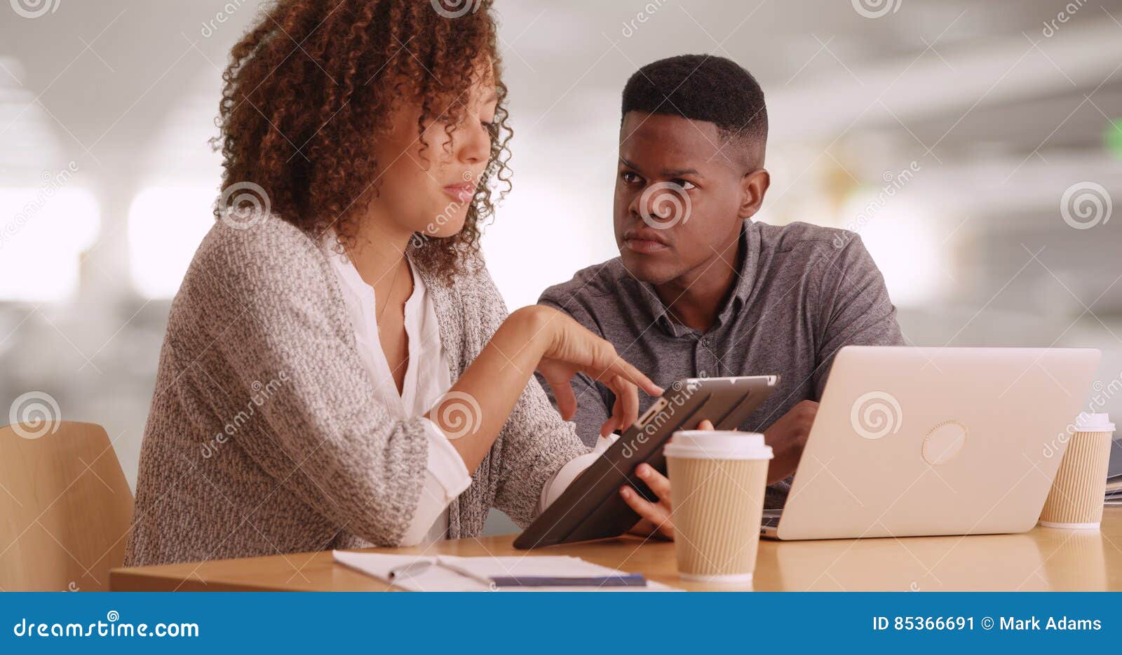 Black People Comparing Notes Stock Photos - Free & Royalty-Free Stock ...