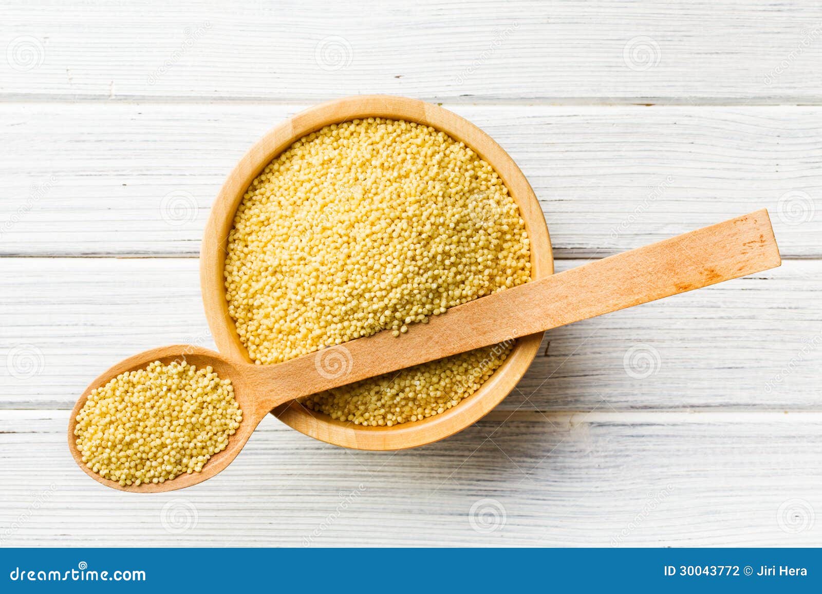 Millet in wooden spoon stock photo. Image of agriculture - 30043772