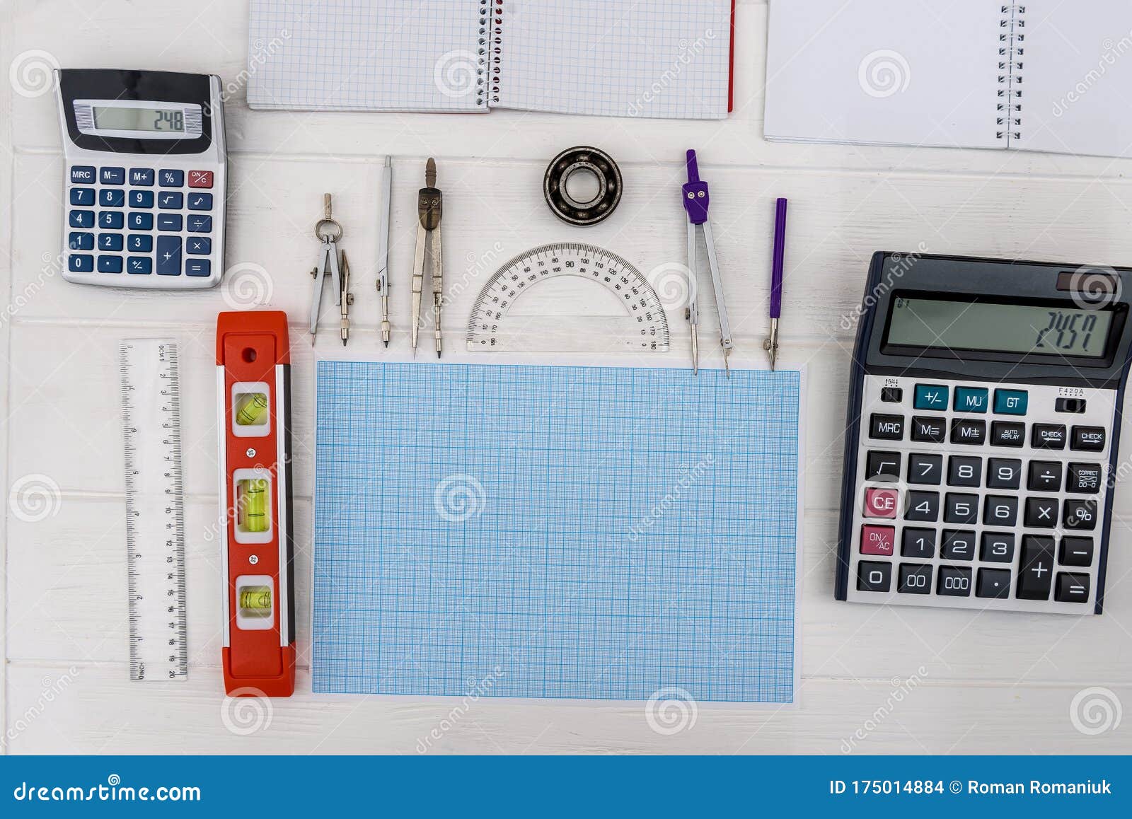 Millimeter Paper with Draft Tools, Calculator and Notepads Stock Photo ...