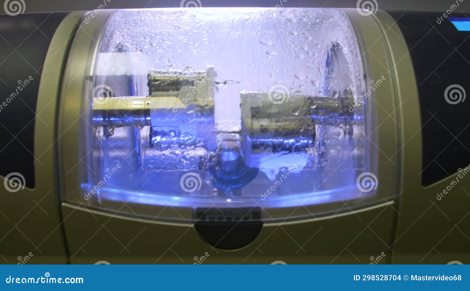 The Milling Machine Cuts the Ceramic Dental Crown from the Workpiece ...