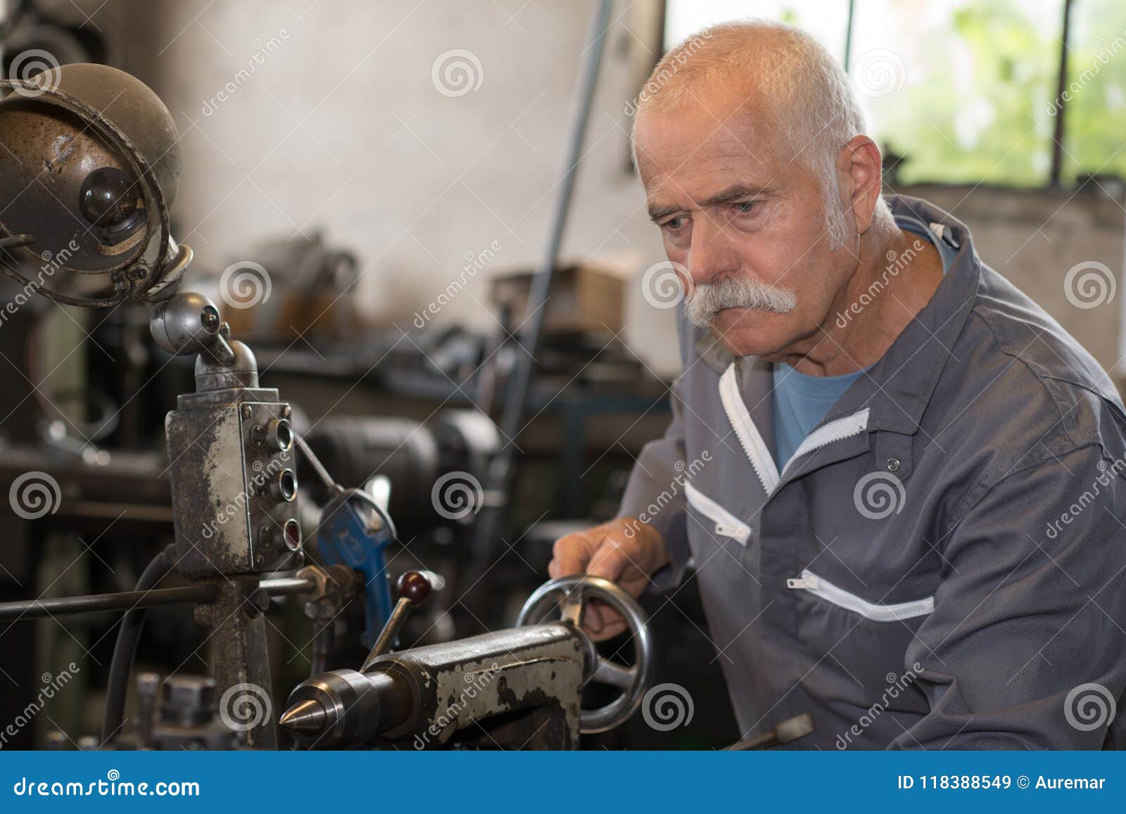 Milling Machine Operator Working in Factory Workshop Stock Image ...