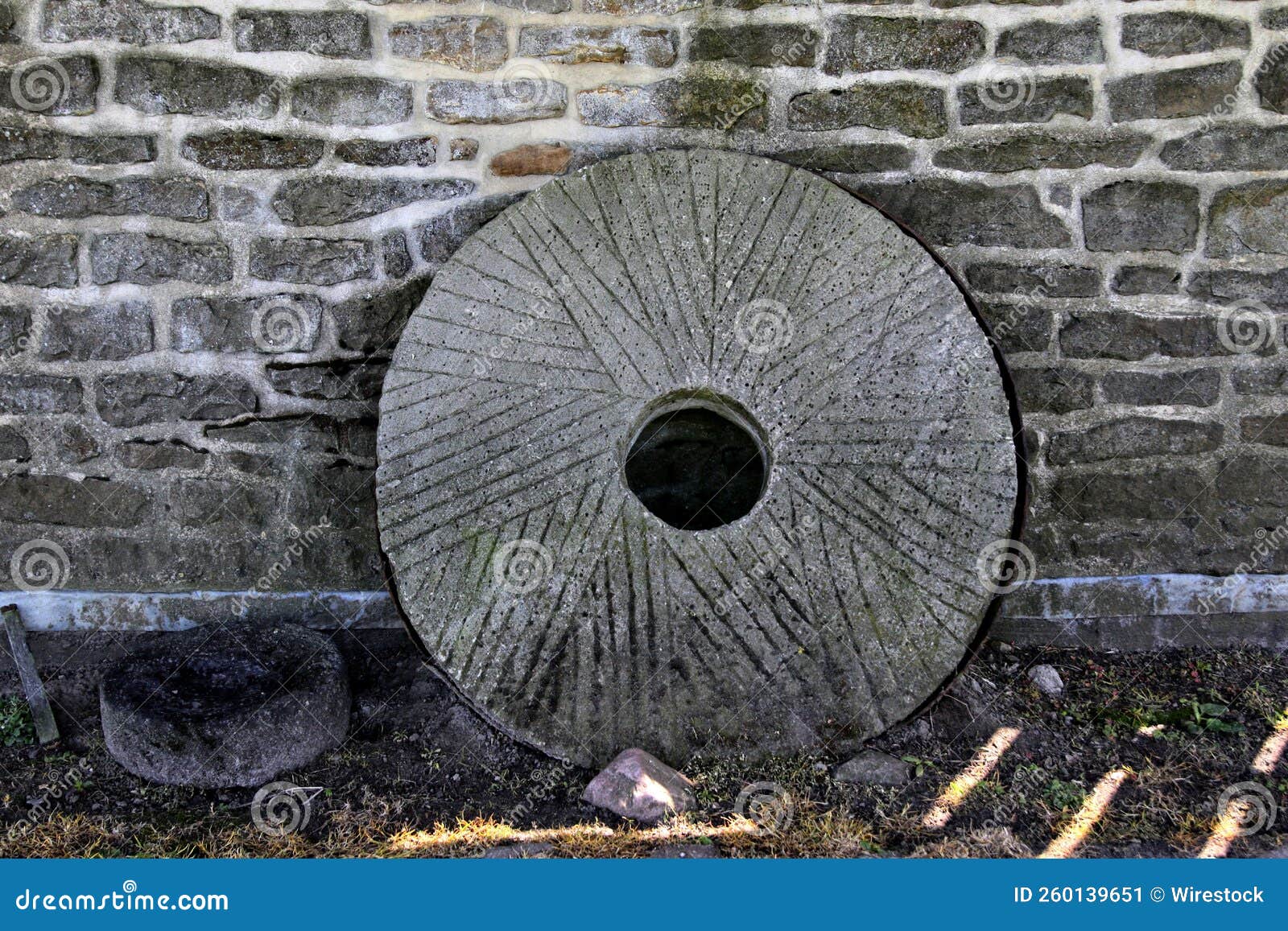 Millstone on the Wall of an Old Farmhouse Stock Image - Image of ...