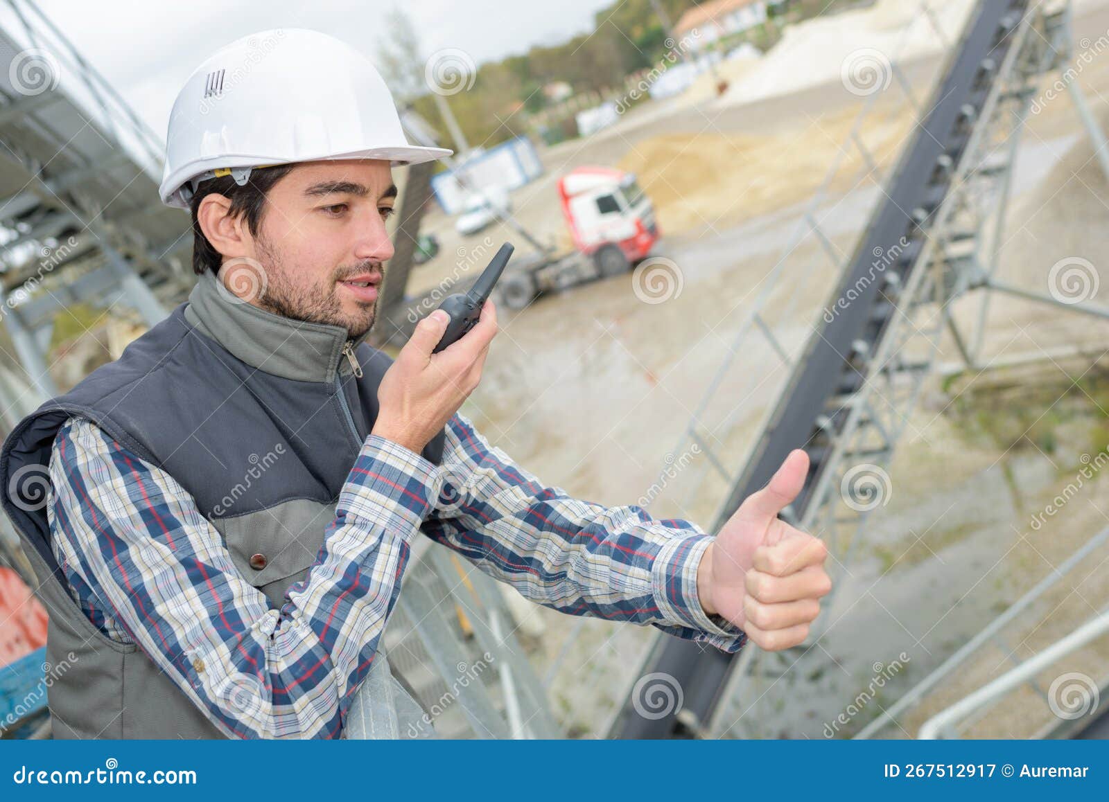 Millwright giving signal stock image. Image of profession - 267512917