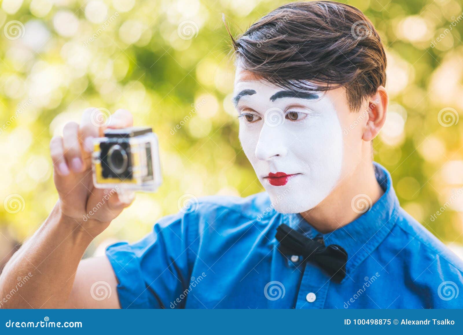 Mime in Blue Shirt Shoot Video on Camera Stock Image - Image of face ...